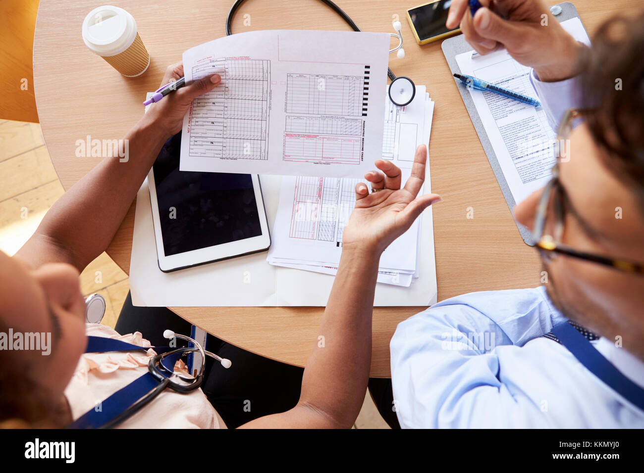 Overhead shot man table hi-res stock photography and images - Alamy