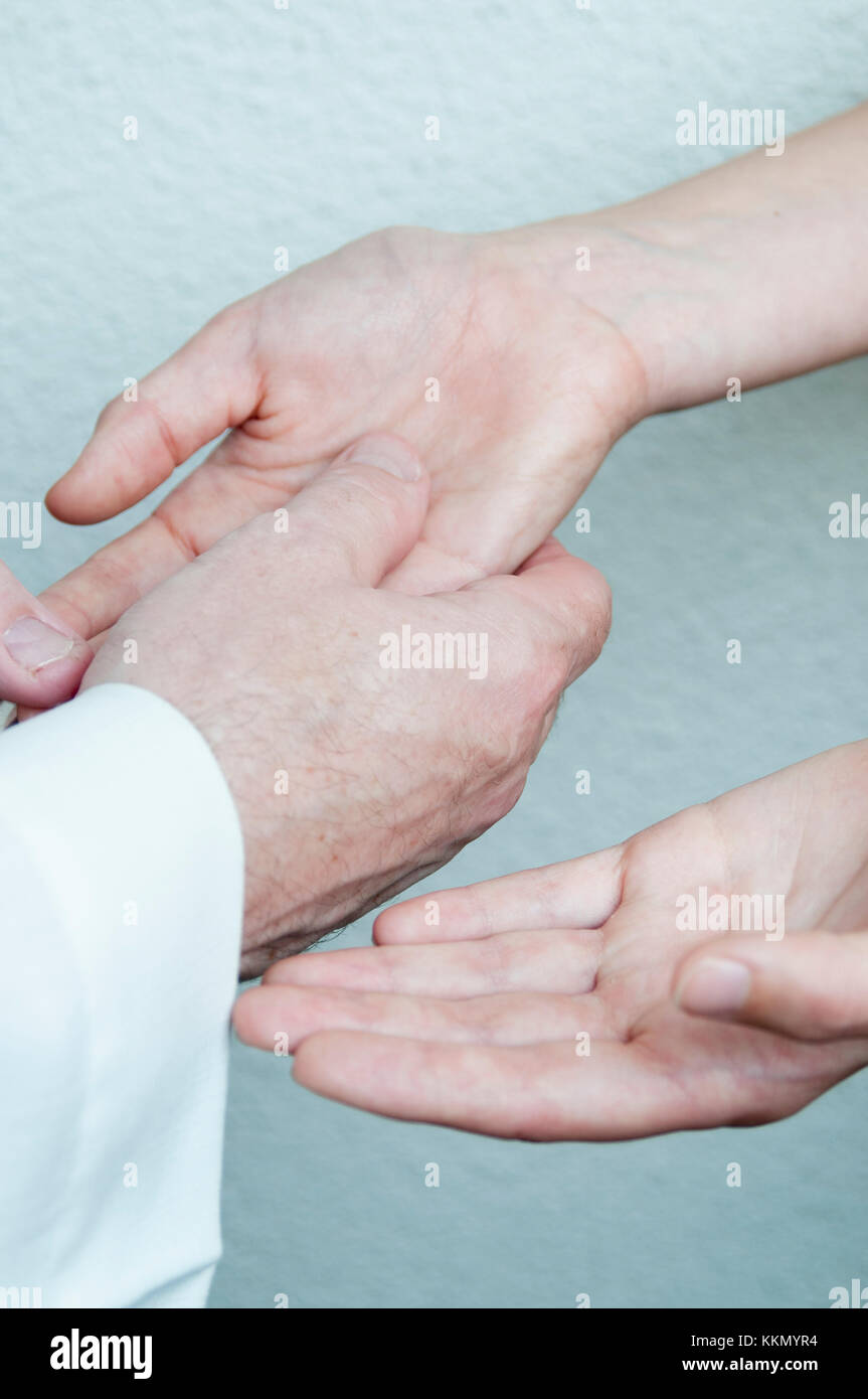 Priest anointing sick hi-res stock photography and images - Alamy