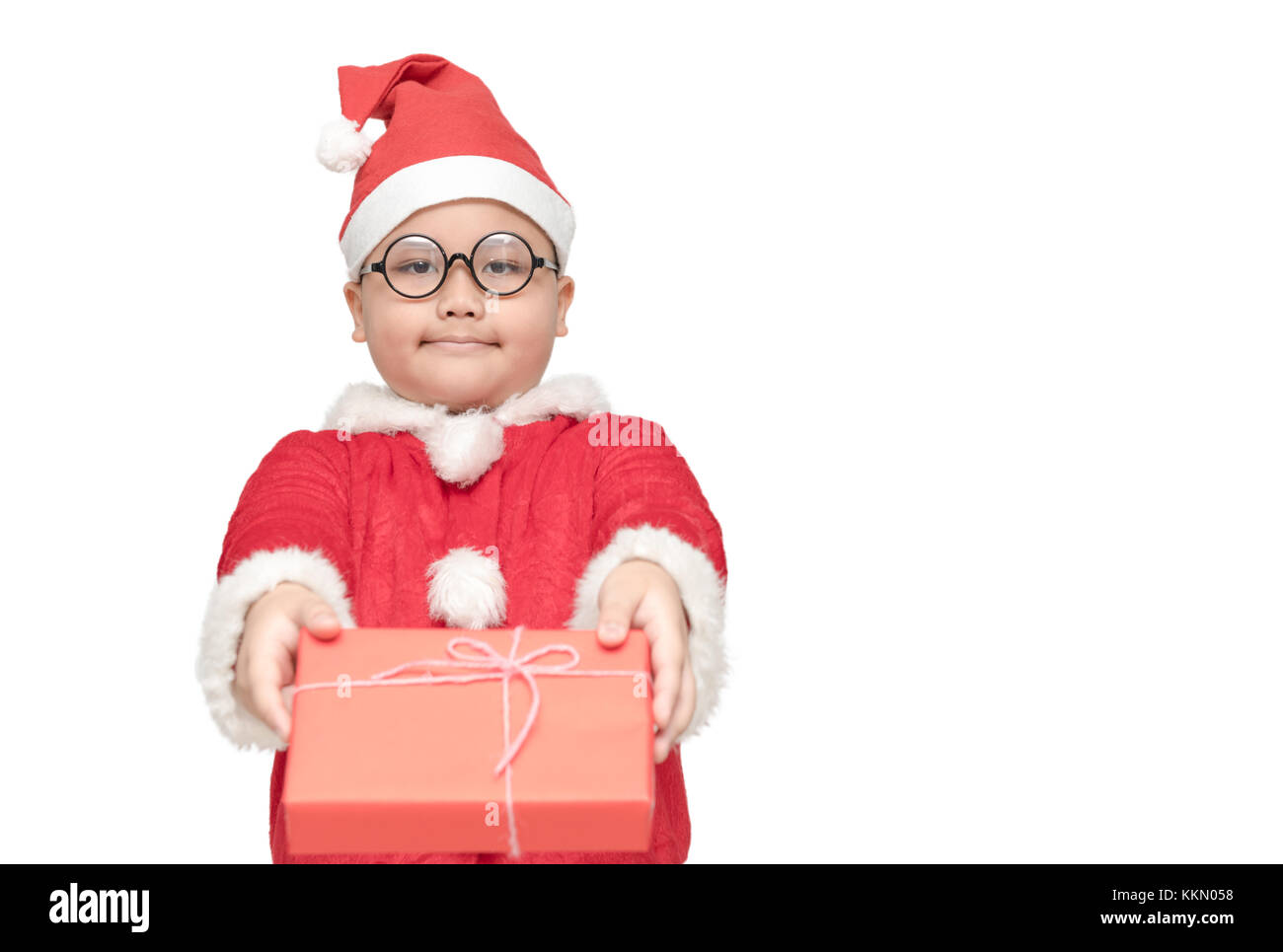 Obese fat boy in santa claus suit giving gift box and smile isolated on ...