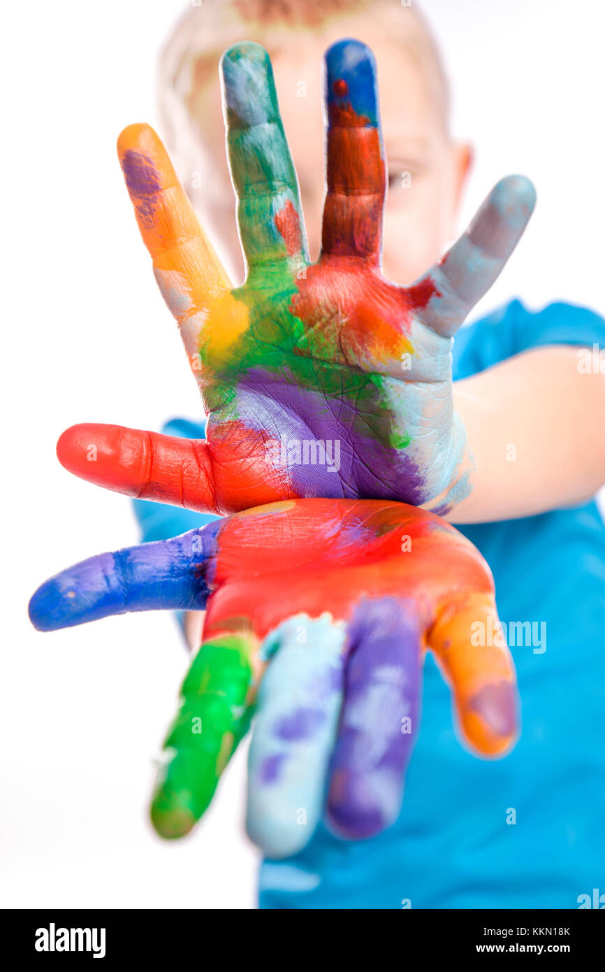 portrait of caucasian child with painted hands isolated on white ...