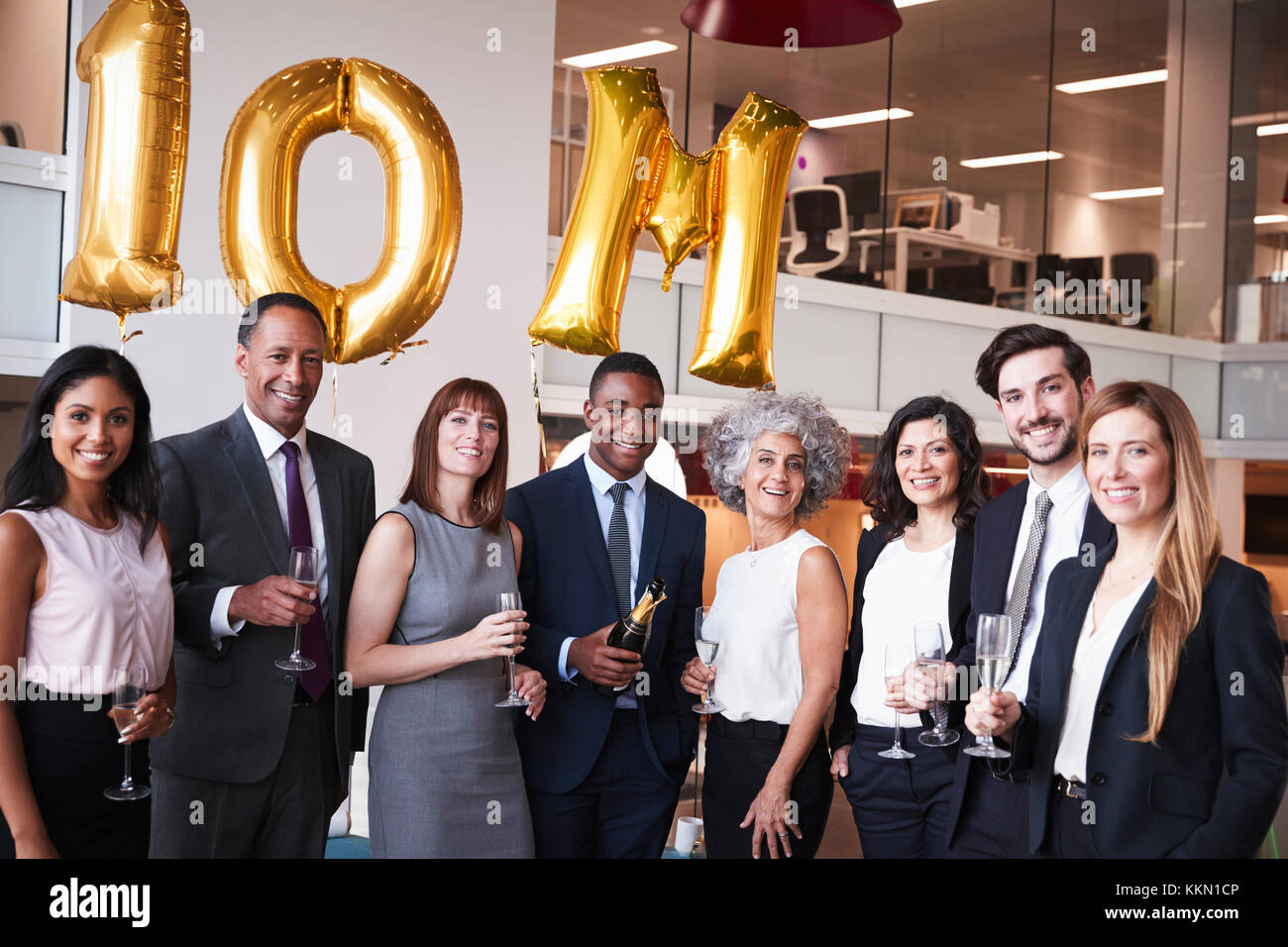 Business people celebrate meeting target in the office Stock Photo - Alamy