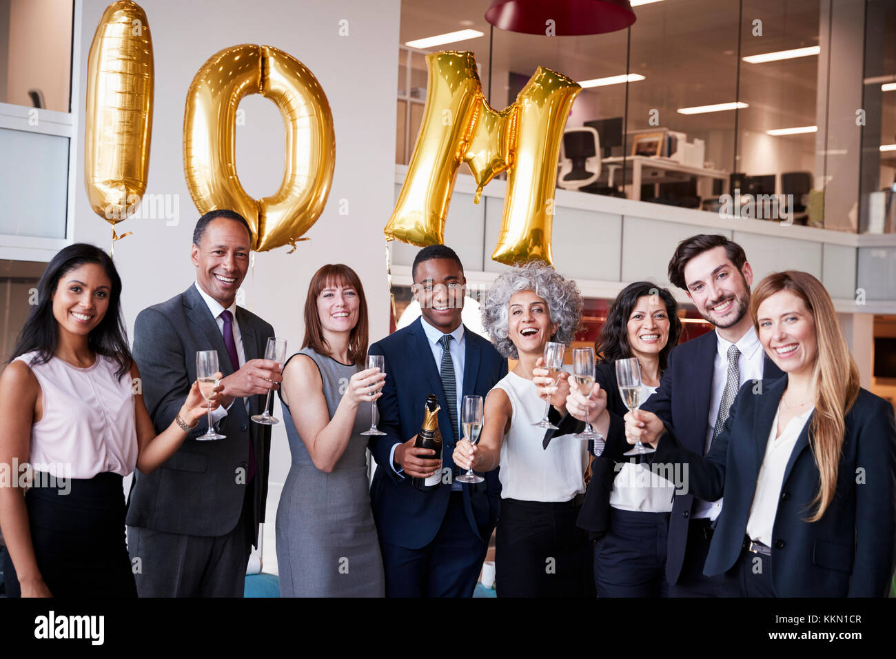 Business people celebrate meeting target in the office Stock Photo - Alamy