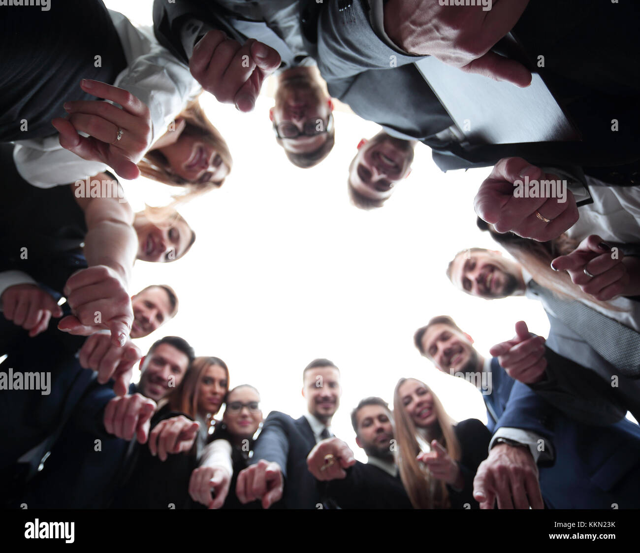 concept of team building.the business team is forming a circle and ...
