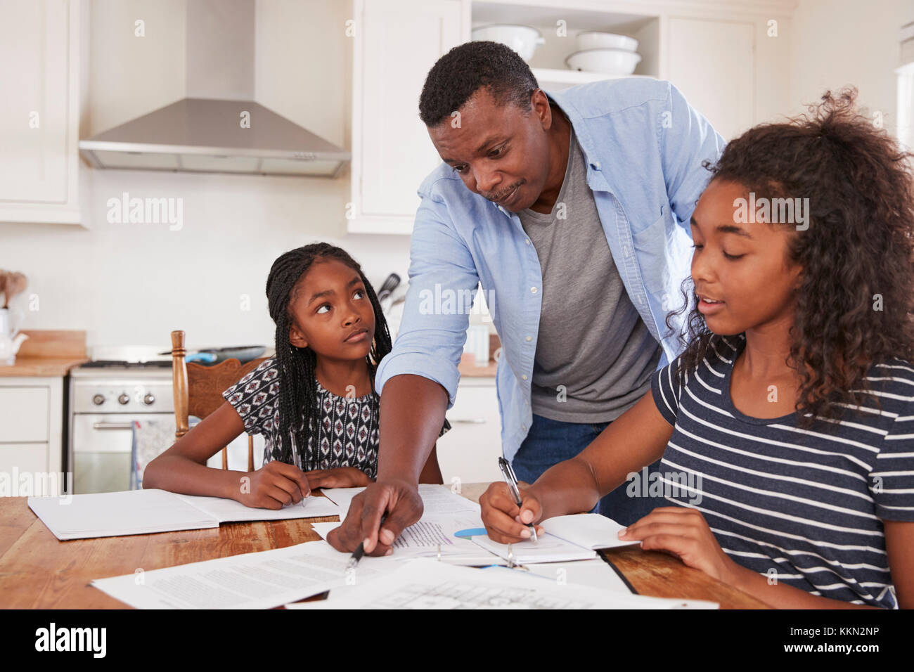 African father child homework hi-res stock photography and images - Alamy