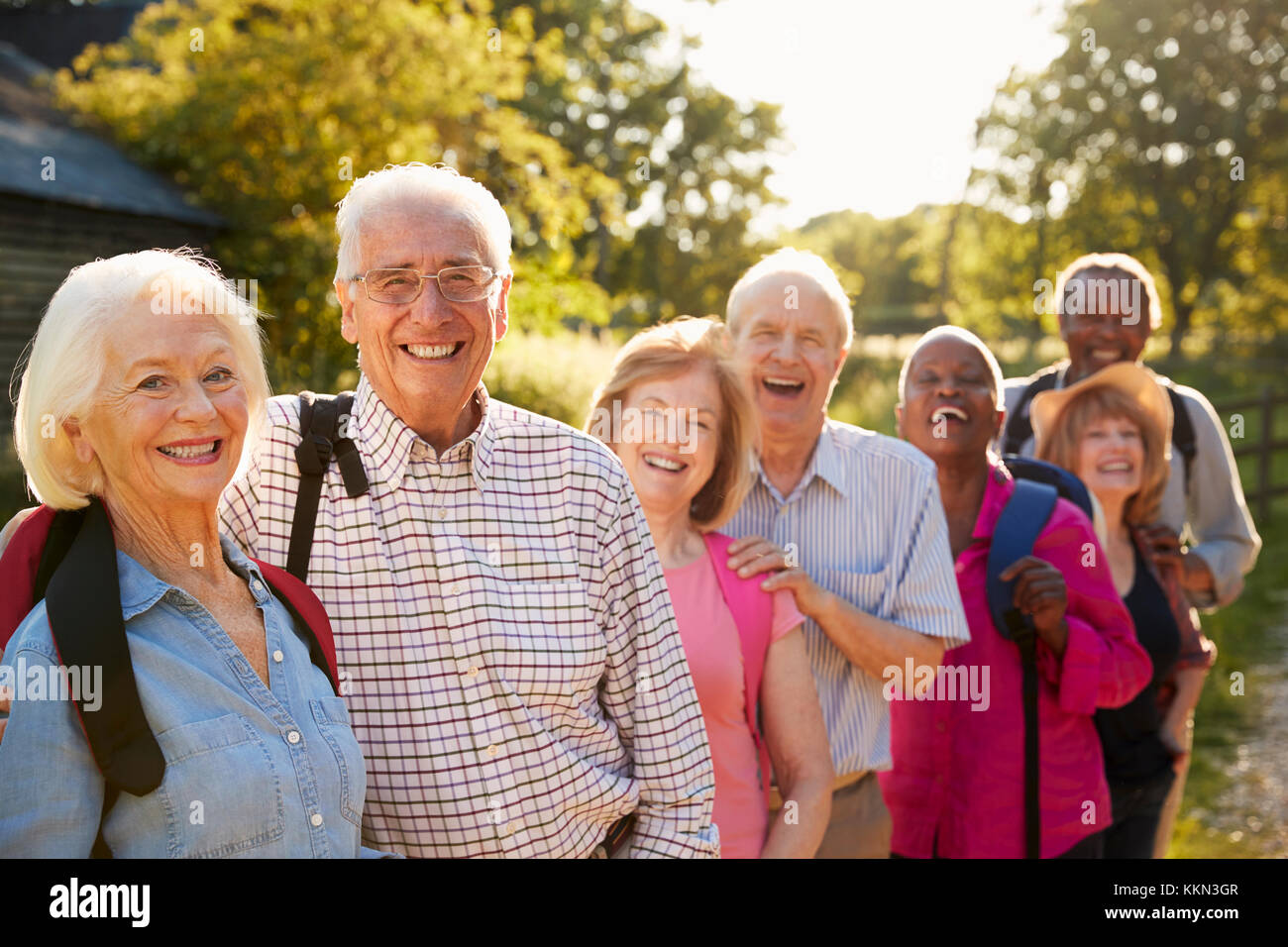 Portrait Of Senior Friends Hiking In Countryside Stock Photo - Alamy