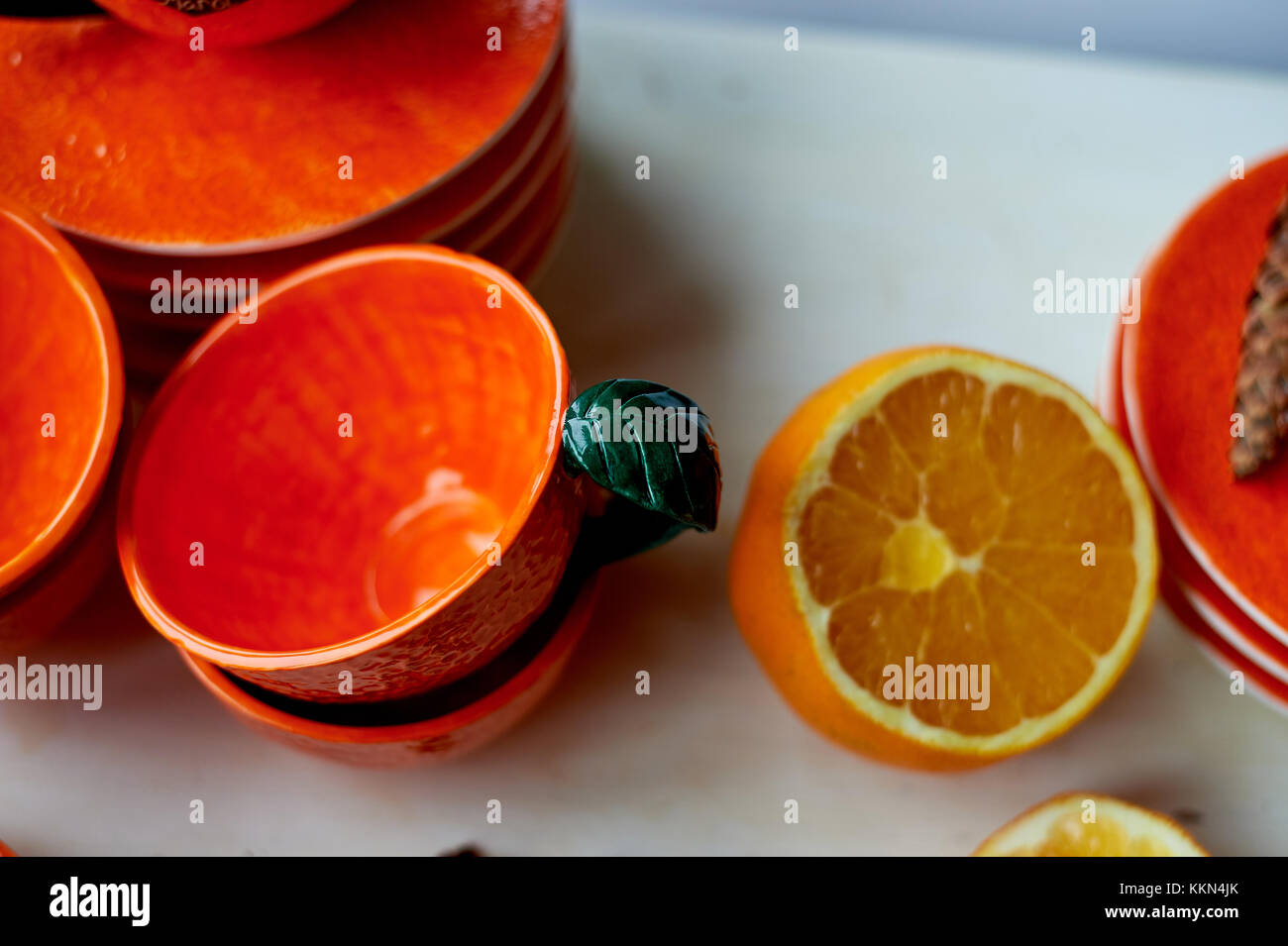 The color of the sun. Warmth. Bright orange dishes in the style of a ...