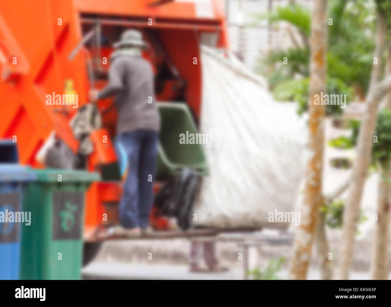 Blur blurred one urban workers municipal recycling garbage collector ...