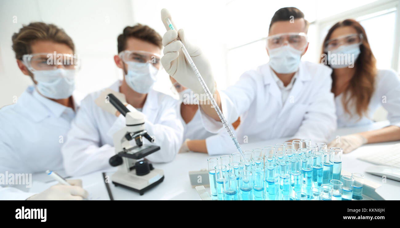 Scientists at chemical laboratory during work Stock Photo - Alamy
