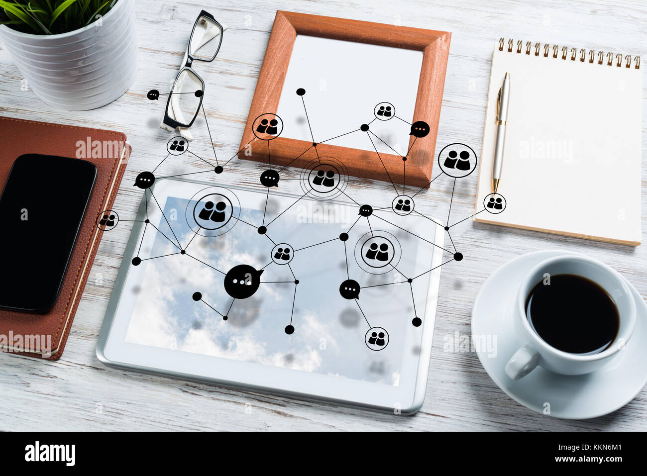Top view of modern workplace with office stuff and social network ...