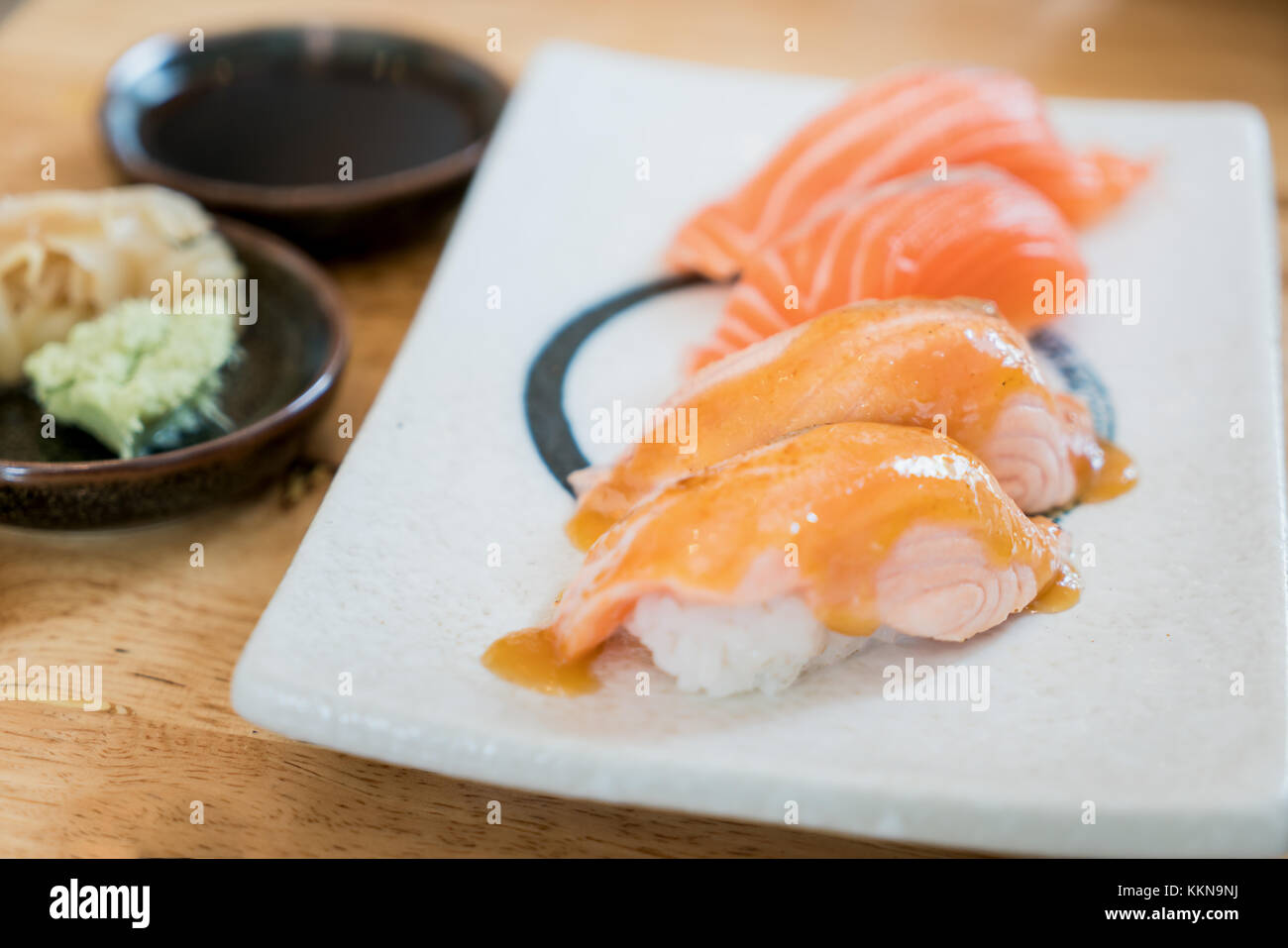 Close up salmon burned top with mayo in plate. Healthy Japanese Nigiri ...