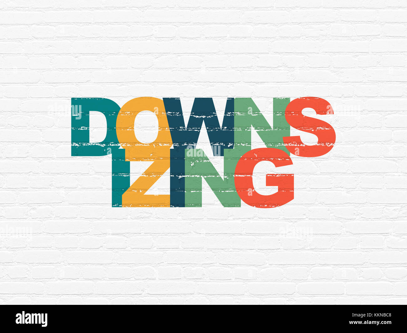 Finance concept: Downsizing on wall background Stock Photo - Alamy