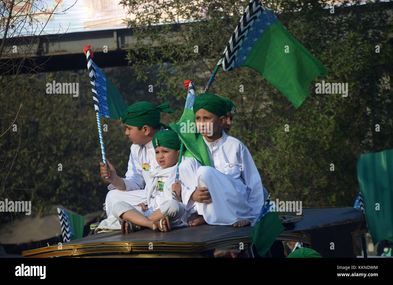 Lahore, Pakistan. 02nd Dec, 2017. Pakistani Muslims wave green flags as ...