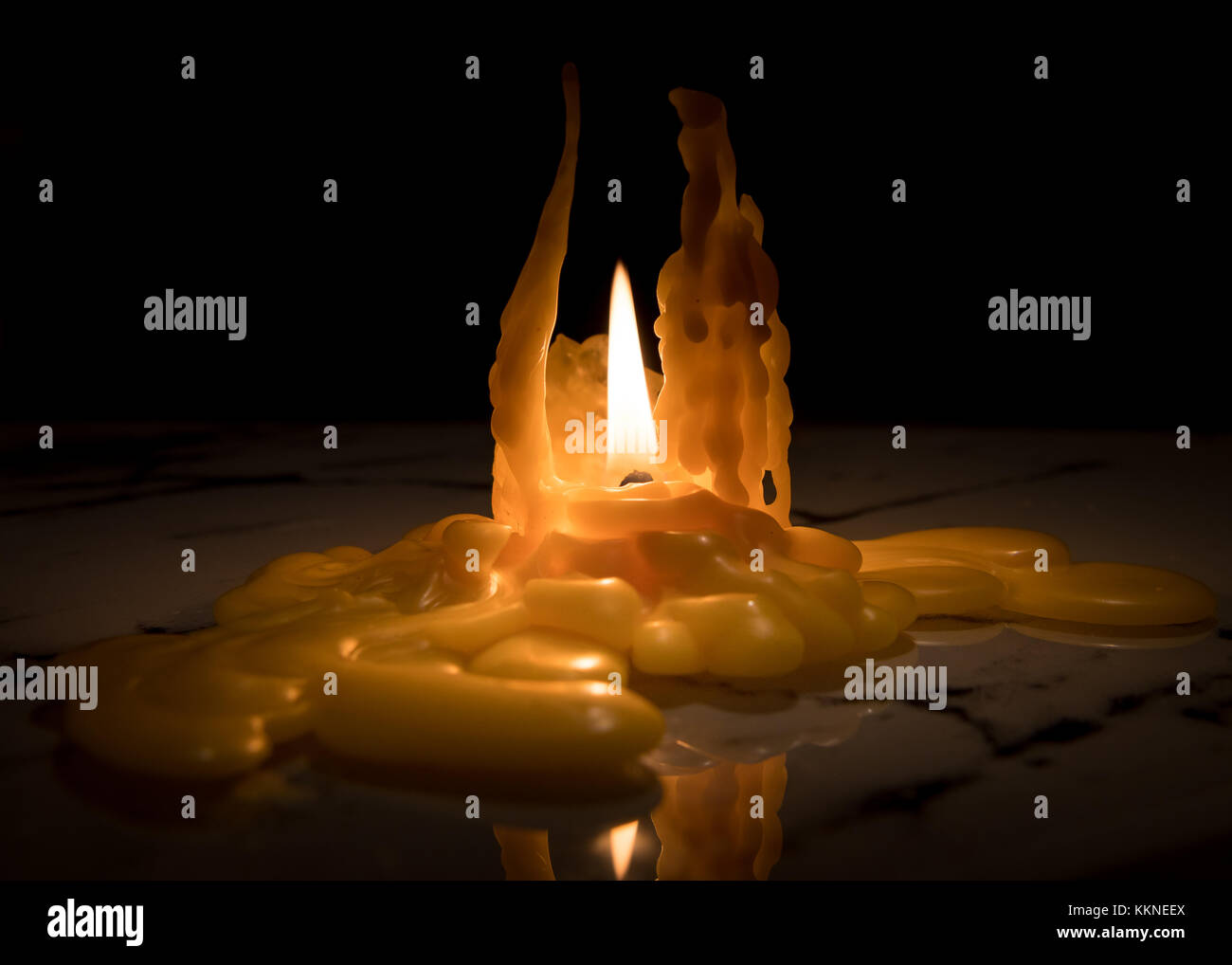 Burning candle with dripping wax hi-res stock photography and images ...