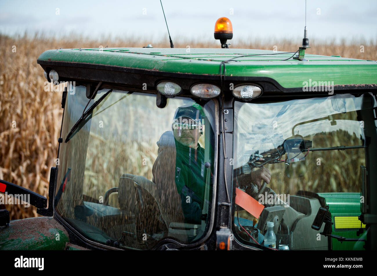 FARMER INSIDE CAB OPERATING JOHN DEERE TRACTOR UTICA MINNESOTA Stock ...