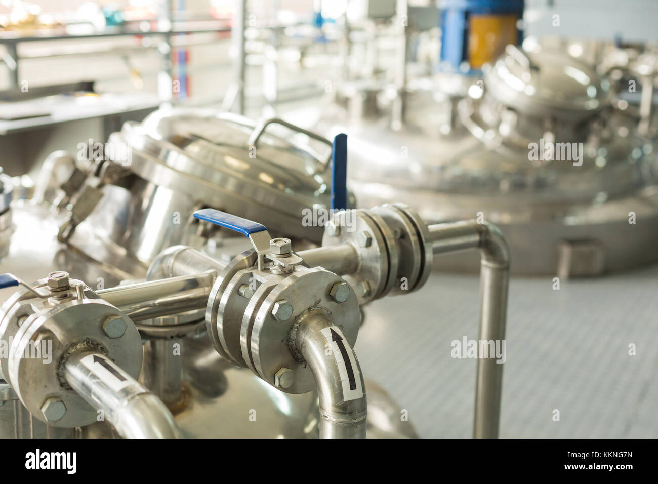 Tanks for chemical mixing on chemical plant. Concept: Manufacturing ...