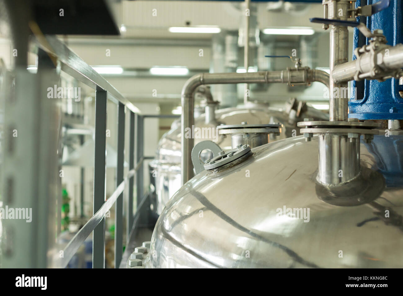 Tanks for chemical mixing on chemical plant. Concept: Manufacturing ...