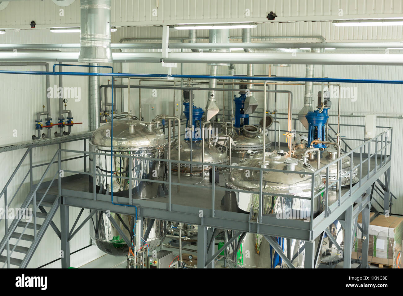 Tanks for chemical mixing on chemical plant. Concept: Manufacturing ...