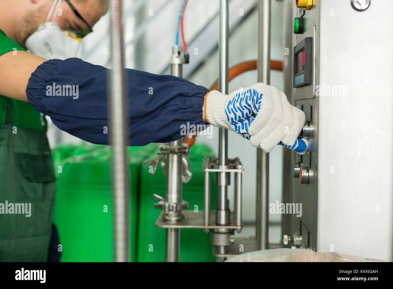 Work includes a control panel in workshop. Concept: Manufacturing Stock ...