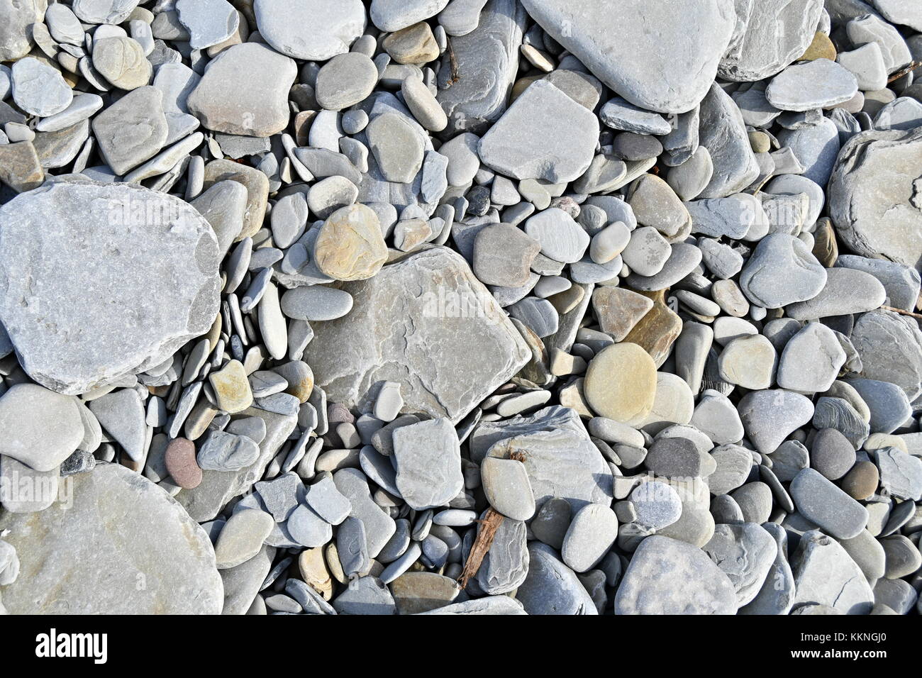 Grey ocean pebbles background stone texture pattern Stock Photo - Alamy