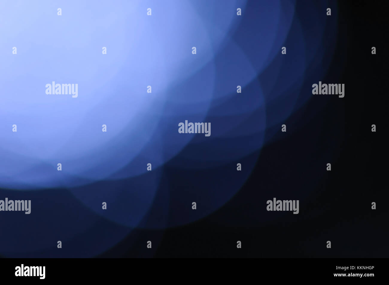 Abstract blue flashing lights on a dark background Stock Photo - Alamy