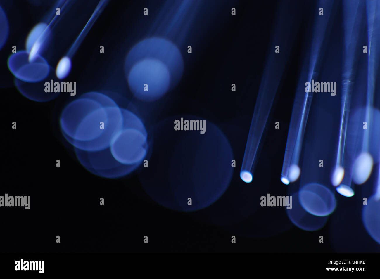 Abstract blue flashing lights on a dark background Stock Photo - Alamy