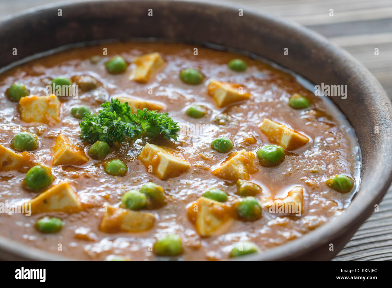 Bowl of mattar paneer Stock Photo - Alamy