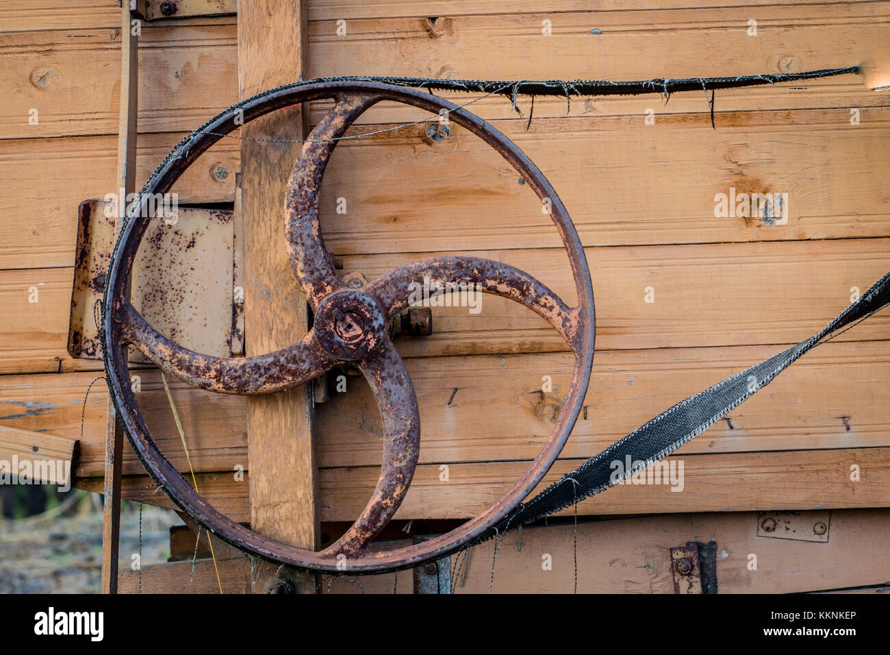 Old pulley in an old agricultural machine. Threshing machine, pulley ...