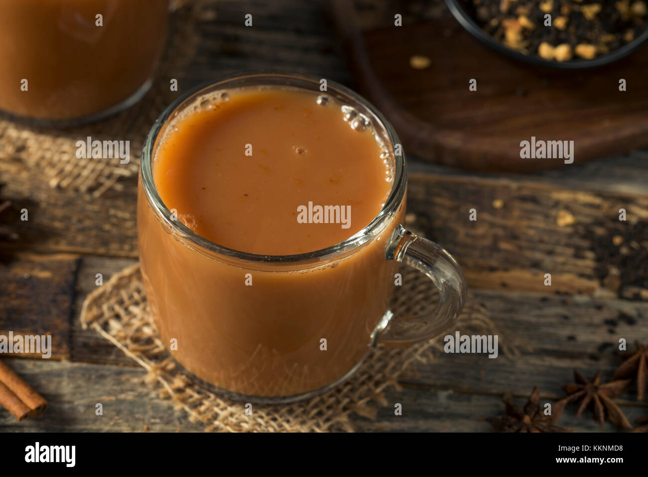 Organic Hot Chai Tea Drink with Milk and Spices Stock Photo - Alamy