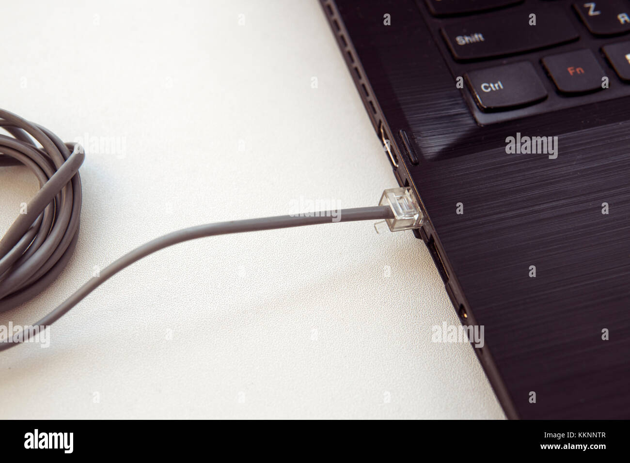 connecting network cable. Network connection concept. connecting cord ...