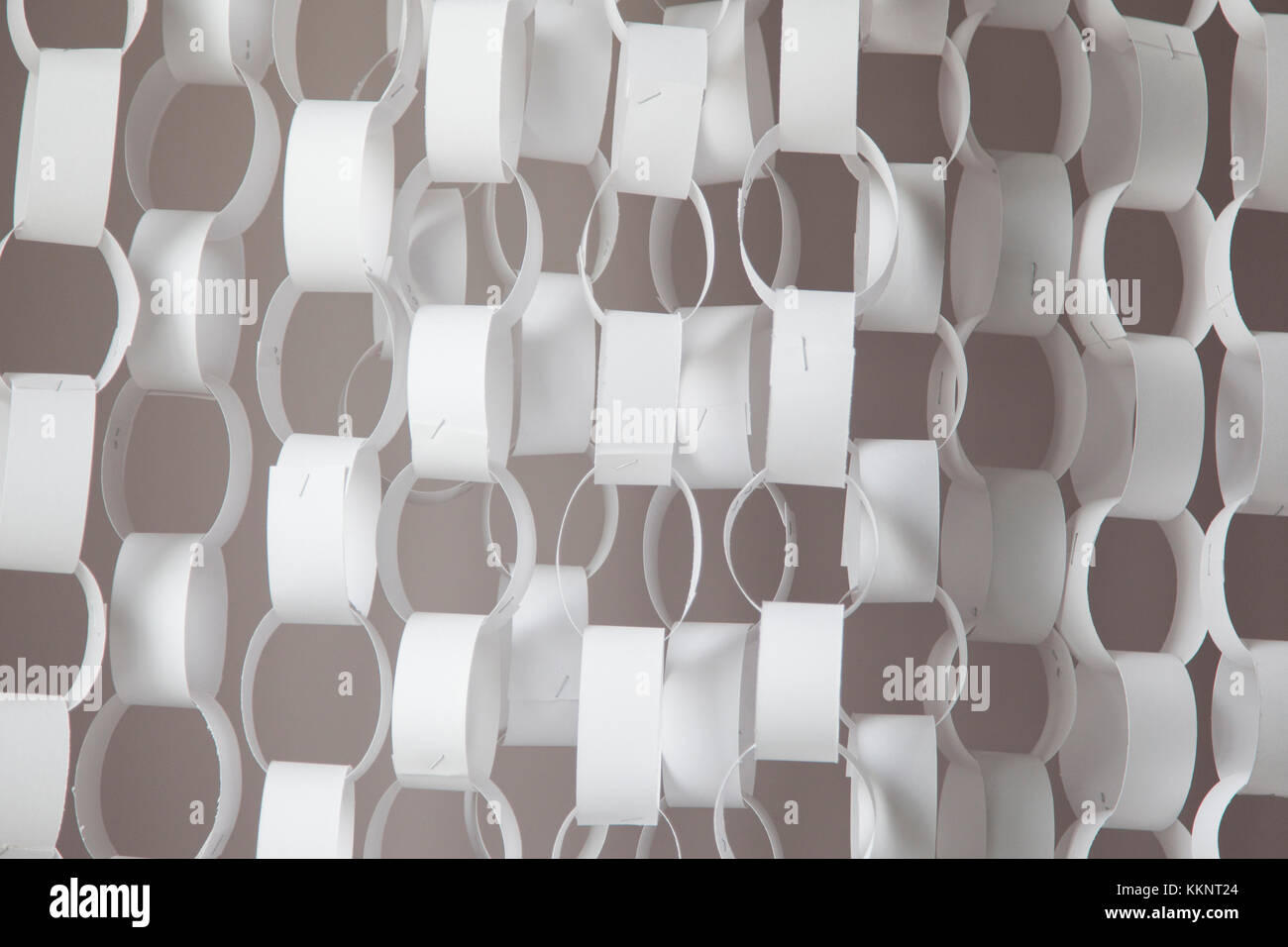 Paper chain decoration background Stock Photo - Alamy