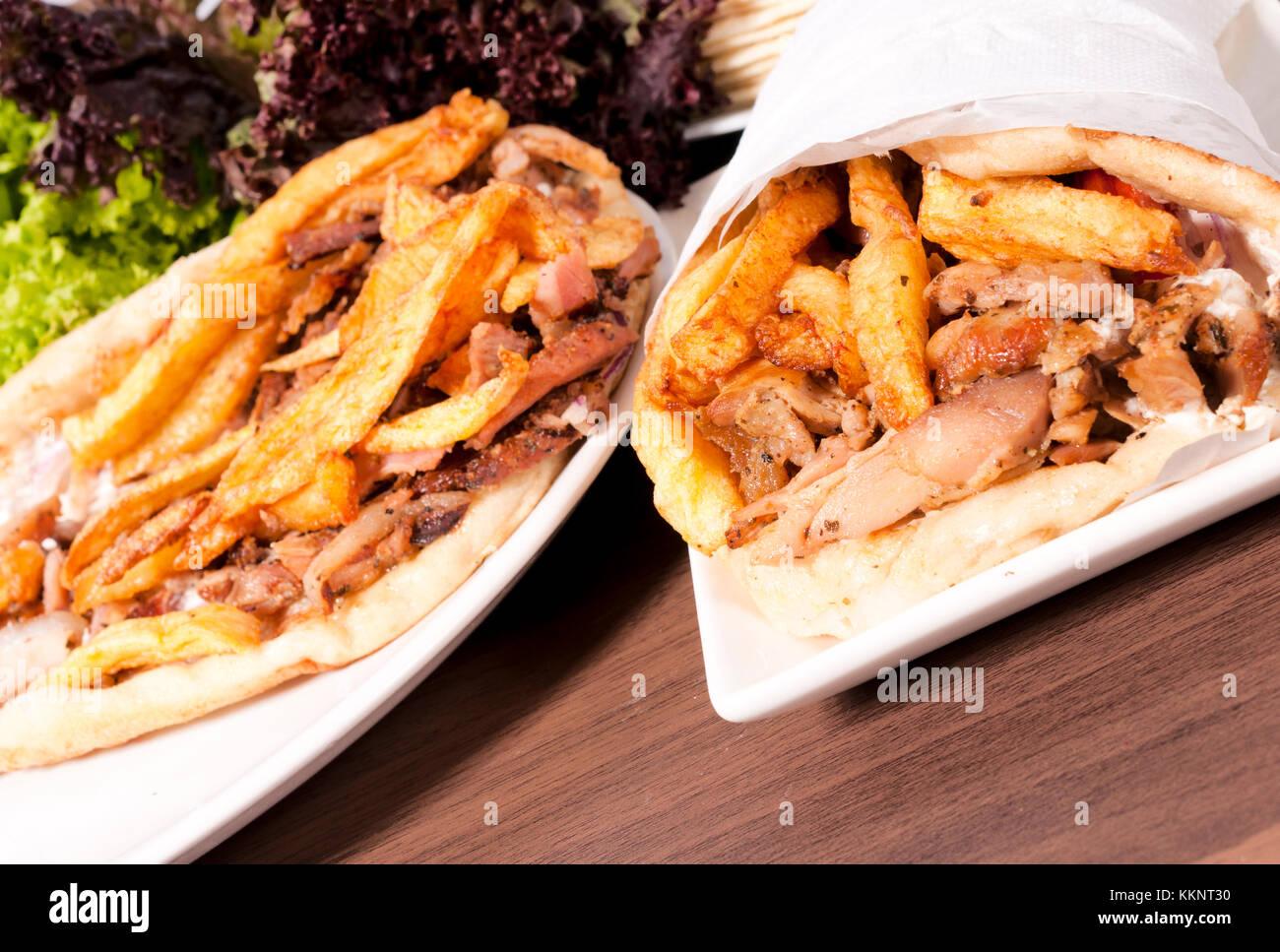 Portions of gyros on the table Stock Photo - Alamy