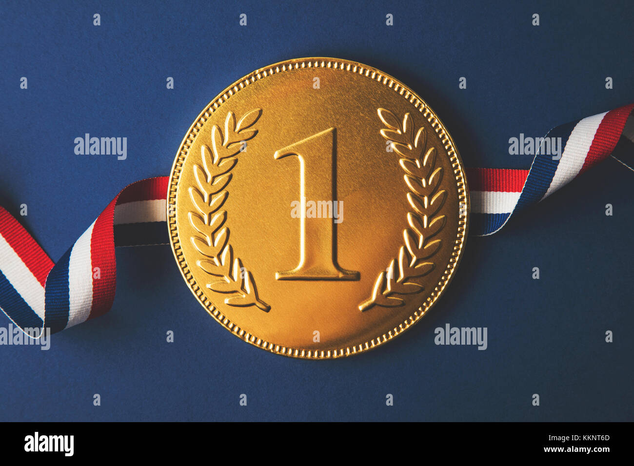 Gold first place winners medal. Success achievement concept Stock Photo ...