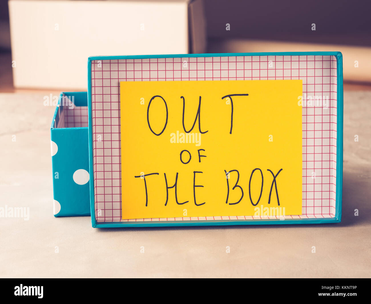 Think out of box creativity concept yellow card Stock Photo - Alamy