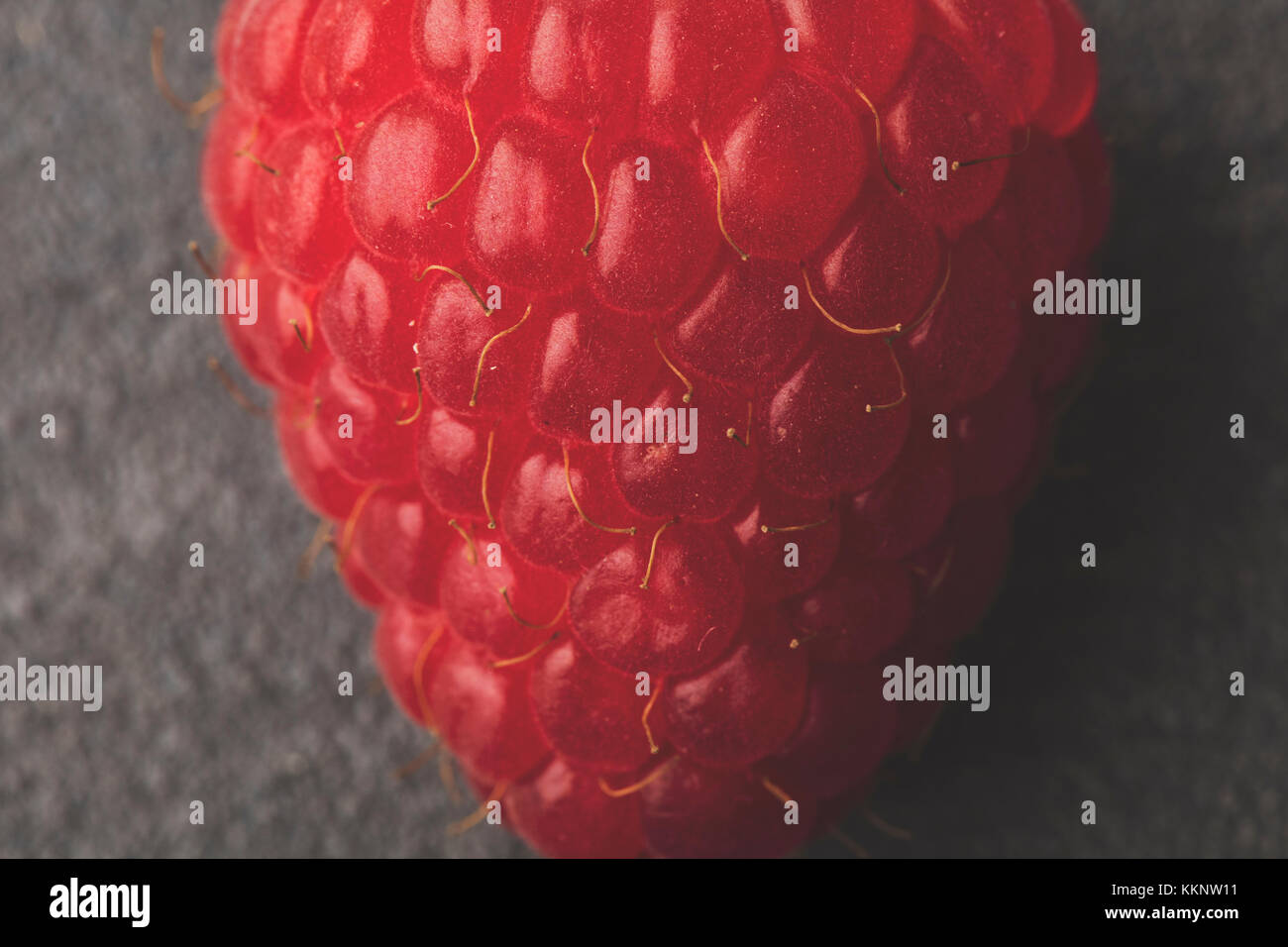 Fresh red raspberries background Stock Photo - Alamy