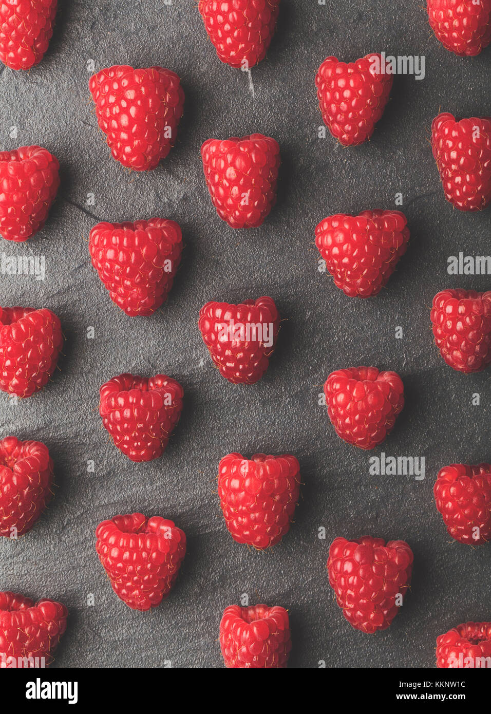 Fresh red raspberries background Stock Photo - Alamy