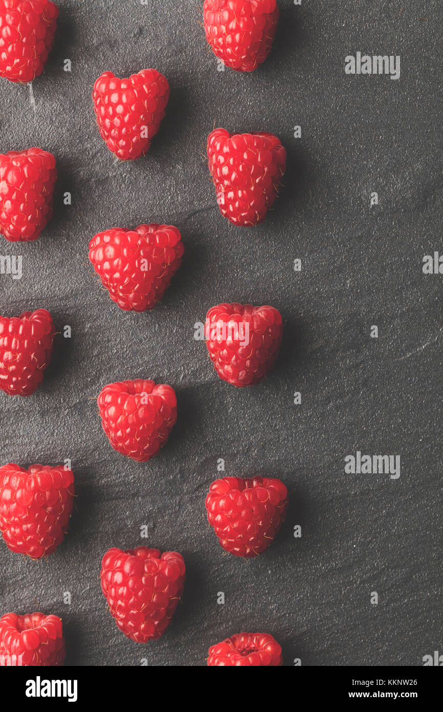 Fresh red raspberries background Stock Photo - Alamy