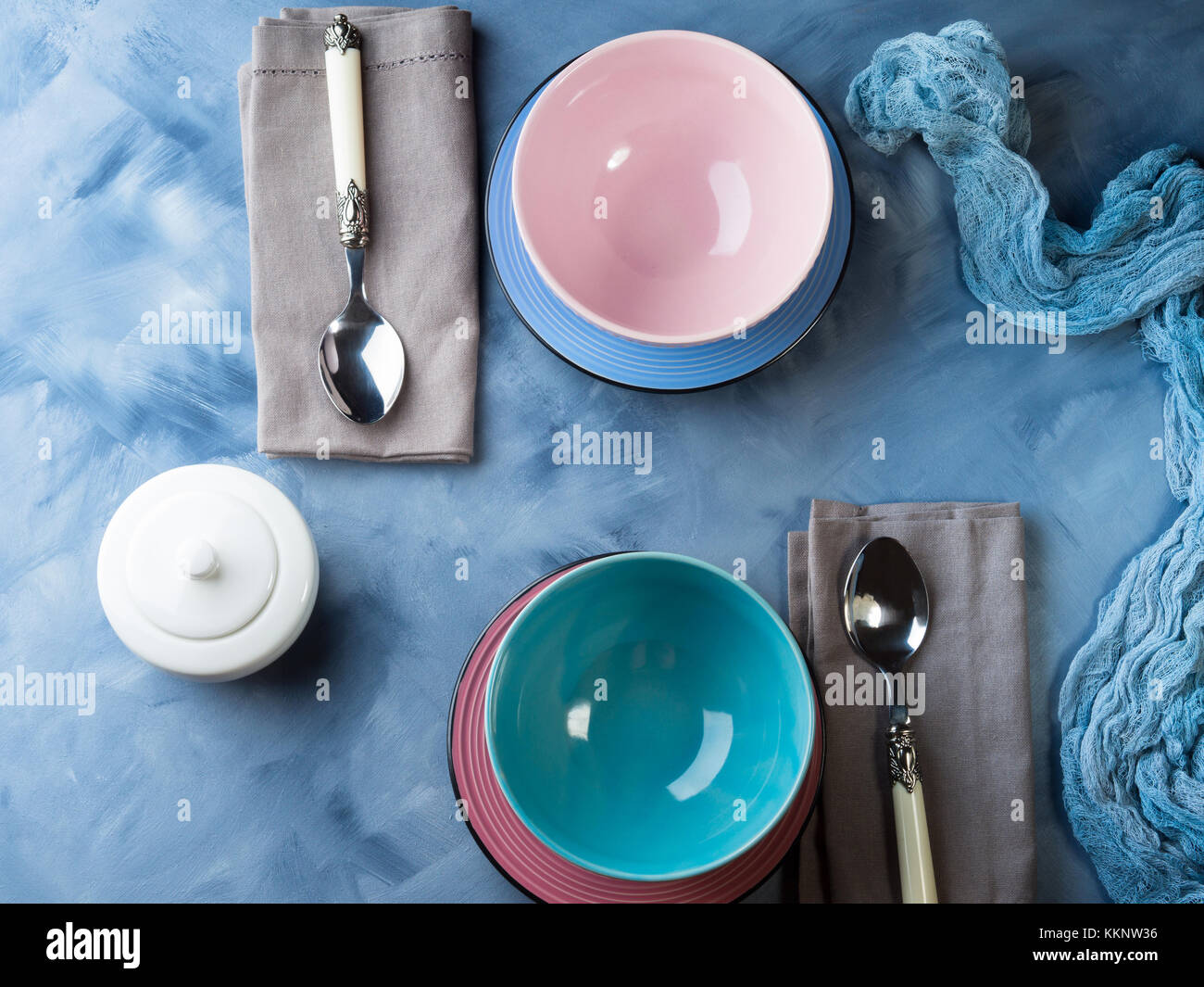 Pastel color Tableware crockery for breakfast or lunch on blue ...