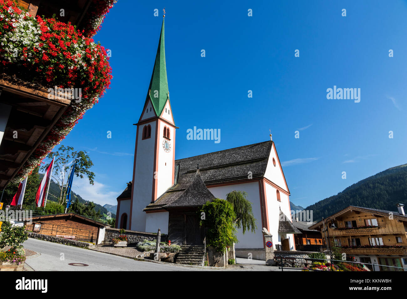 The Saint Oswald Parish Church in Alpbach, a town in western Austria in ...