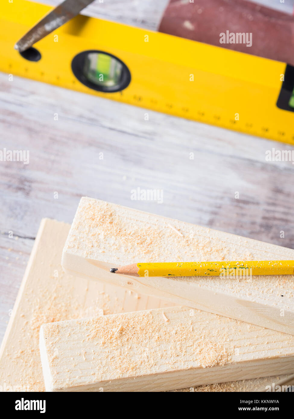 Wooden board with tools for manual measuring cutting - meter, level ...