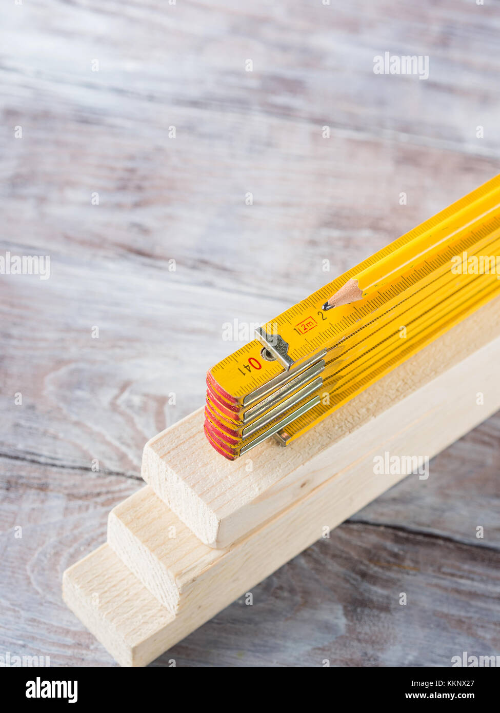 Wooden material pieces and measuring meter yellow pencil tools for ...