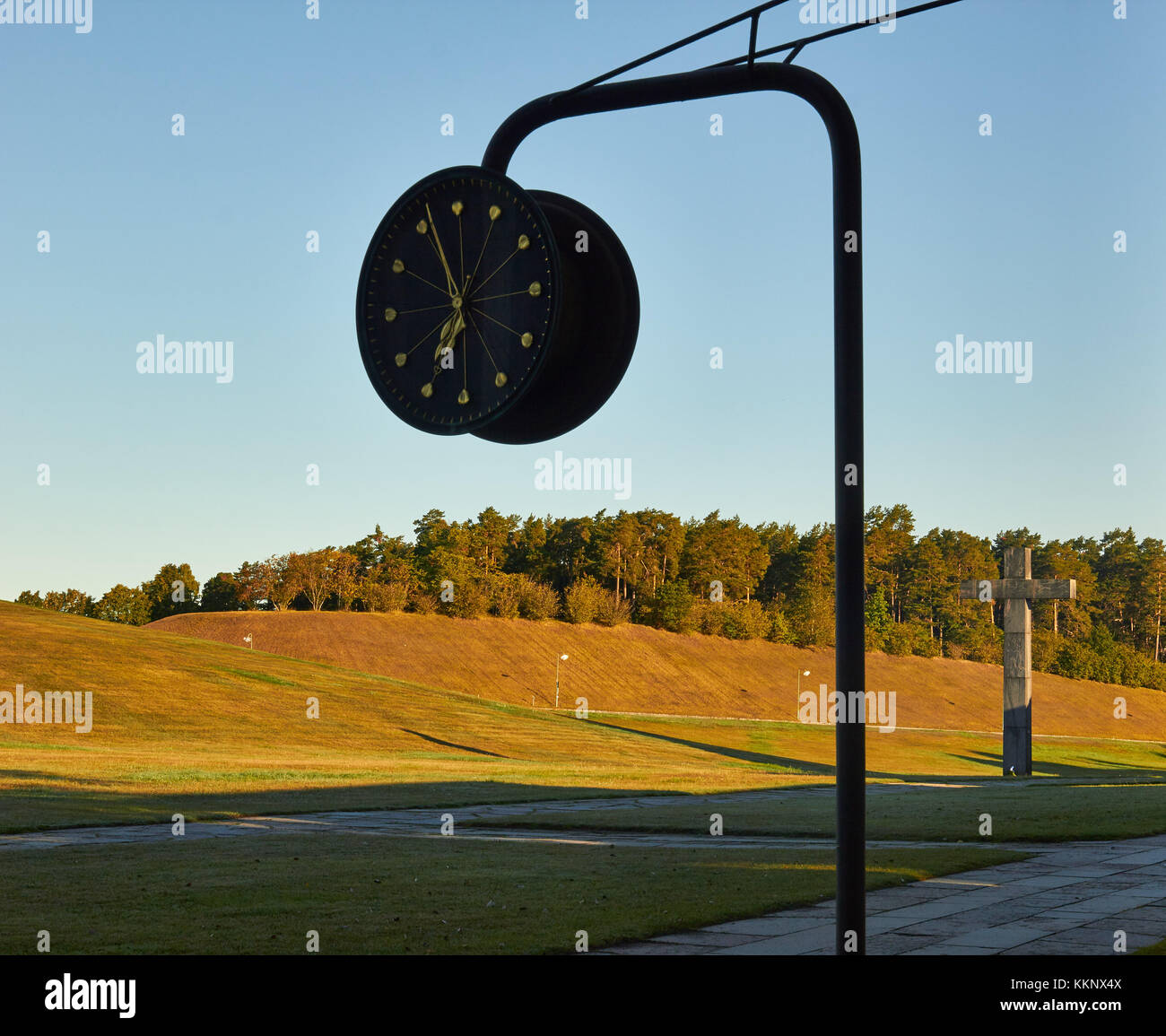 Clock and giant granite cross in Skogskyrkogarden cemetery a UNESCO ...