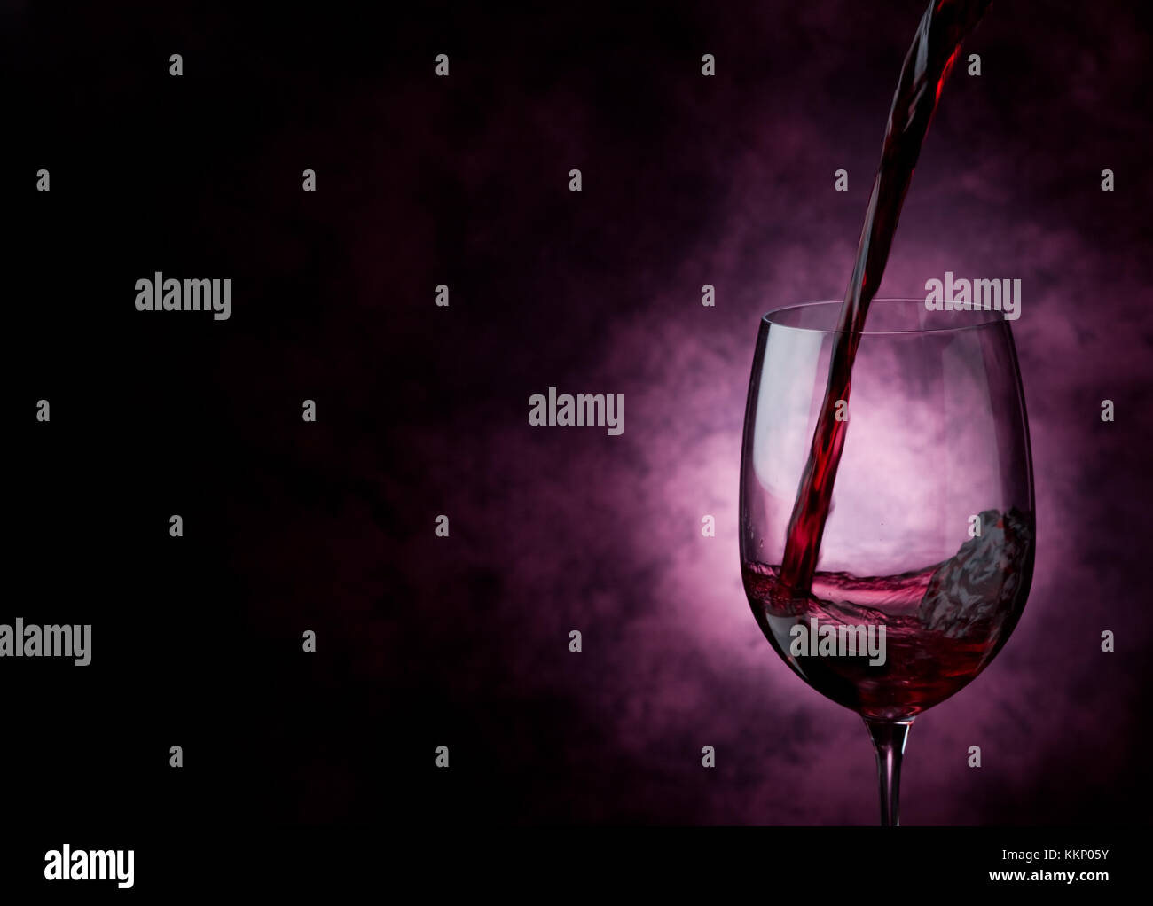 Photo of Red Wine inside a wine glass with abstract background Stock ...
