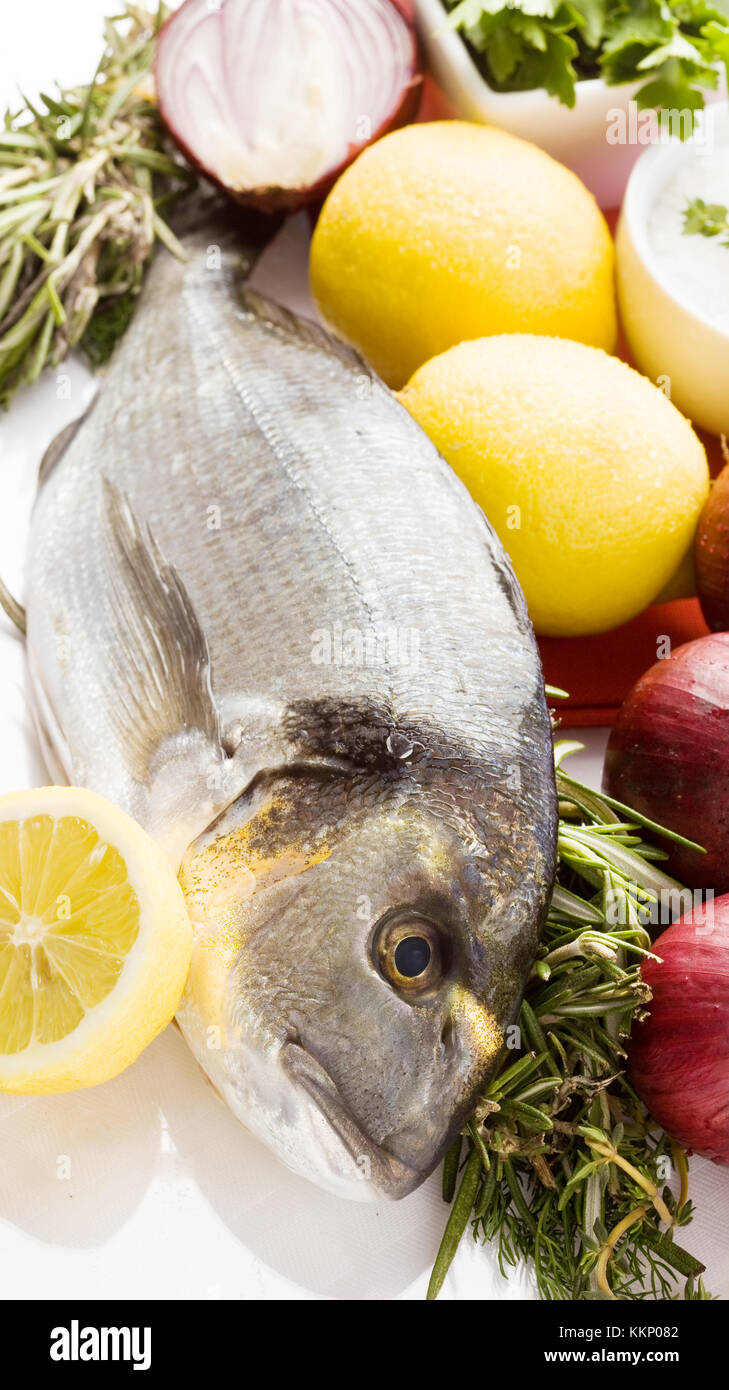 photo of bream with different ingredients on white background Stock ...