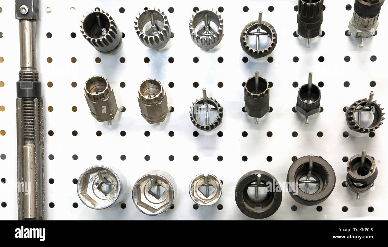 mechanical workshop tools hanging on the fitted wall Stock Photo - Alamy