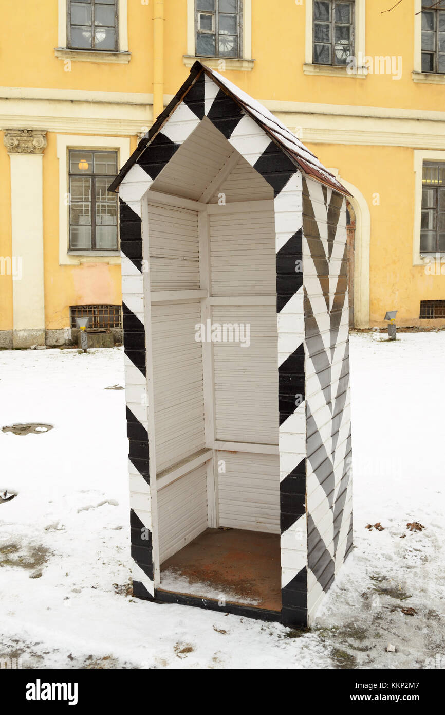 A guard shack at the entrance,painted in black and white Stock Photo ...