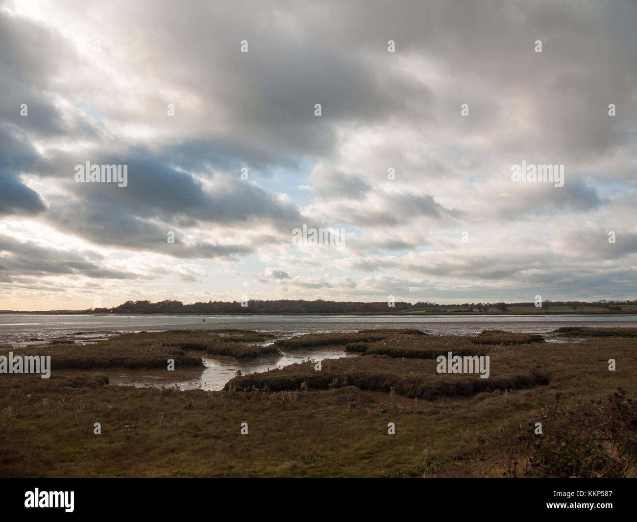 stunning dramatic cloud sky over estuary lake river ocean coastline ...