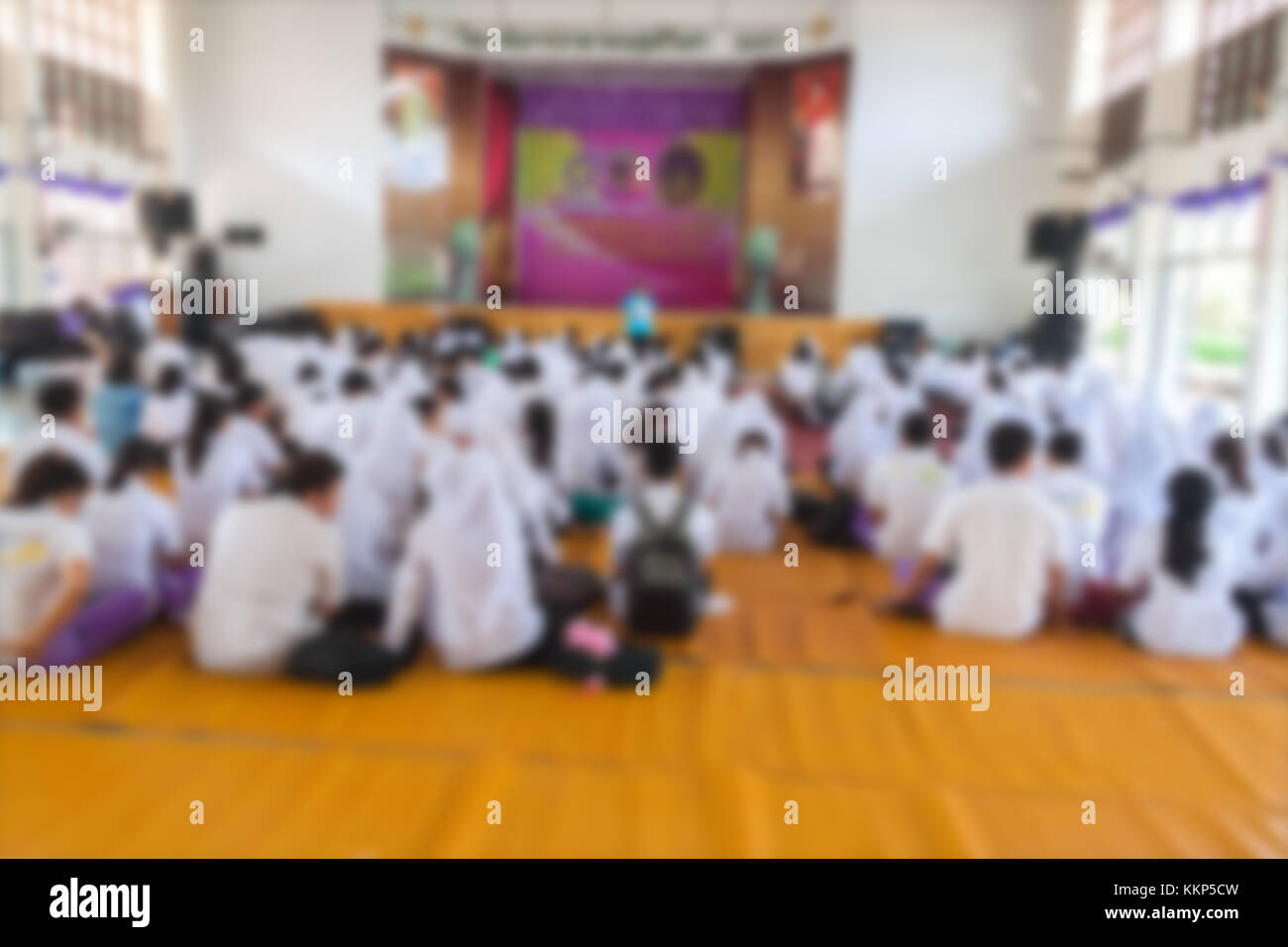 Blurred abstract background of university students sitting in a lecture ...