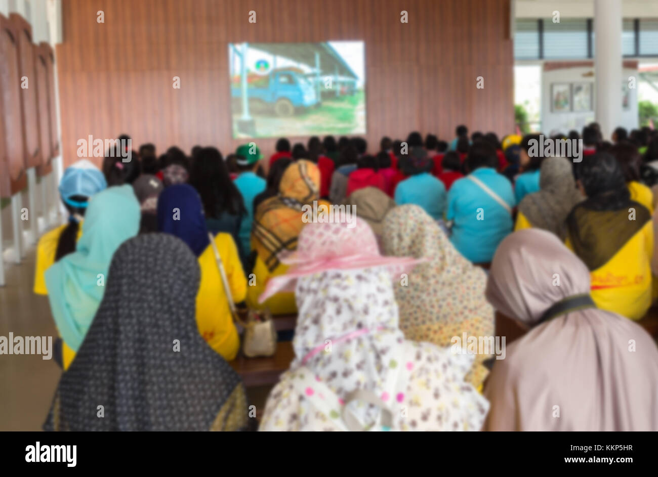 Blurred abstract background of university students sitting in a lecture ...