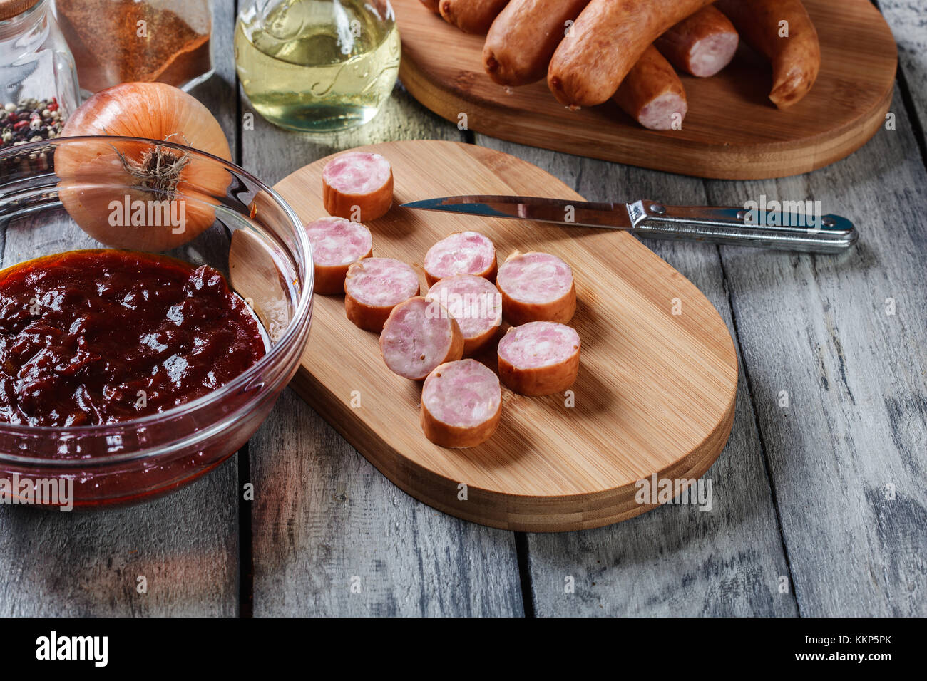 Ingredients ready for preparing German currywurst with curry sauce ...