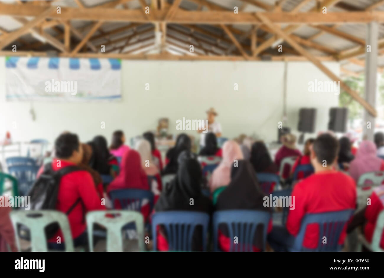 Blurred abstract background of university students sitting in a lecture ...